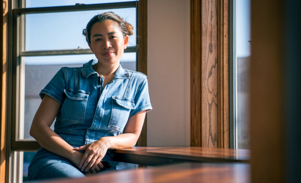 Sandy Thongsavat-Potter, founder of Sandy's World of Eats, poses for a ...
